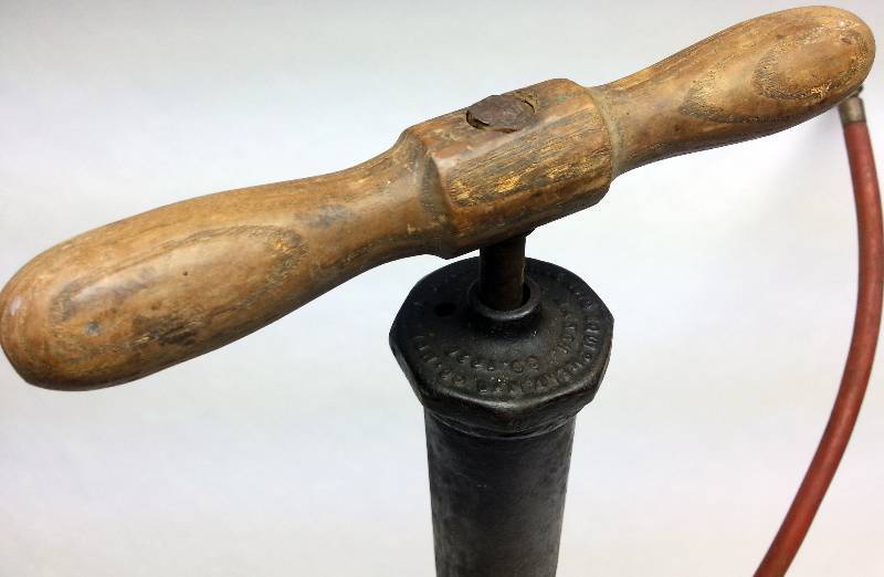 Antique hand operated tire pump. Not for the light weights It will need ...