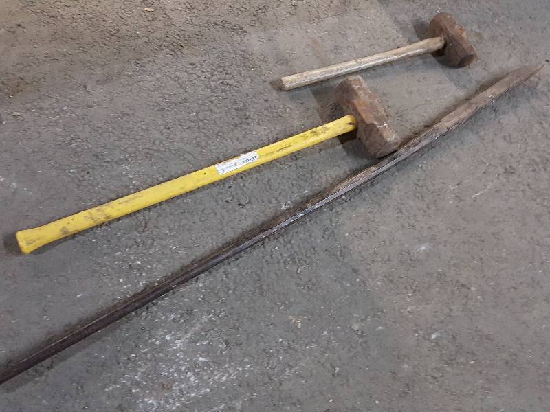 Short and long heavy sledge hammers and a 6 foot serious steel pry bar ...
