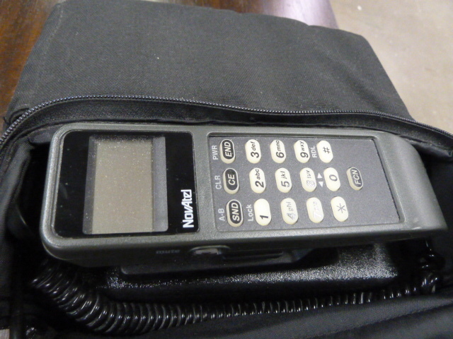 ONE OF THE FIRST CELL PHONES EVER....NOVATEL PHONE IN A CARRYING BAG ...