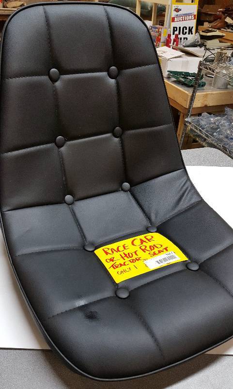 Black upholstered buck seat. It's new and has a great button tuck ...