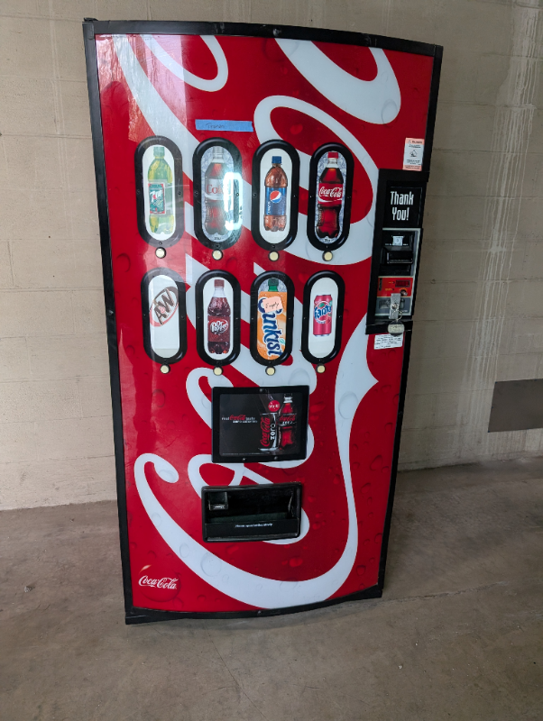 Olathe Industrial Auction- Vending Machines, Laptops, Makita Chargers ...
